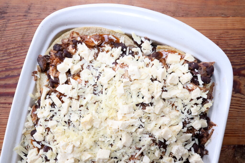 Our Family’s Favorite Layered Chicken Enchilada Casserole - From ...