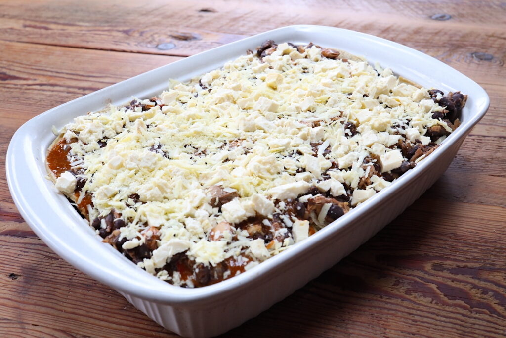 Our Family’s Favorite Layered Chicken Enchilada Casserole - From ...
